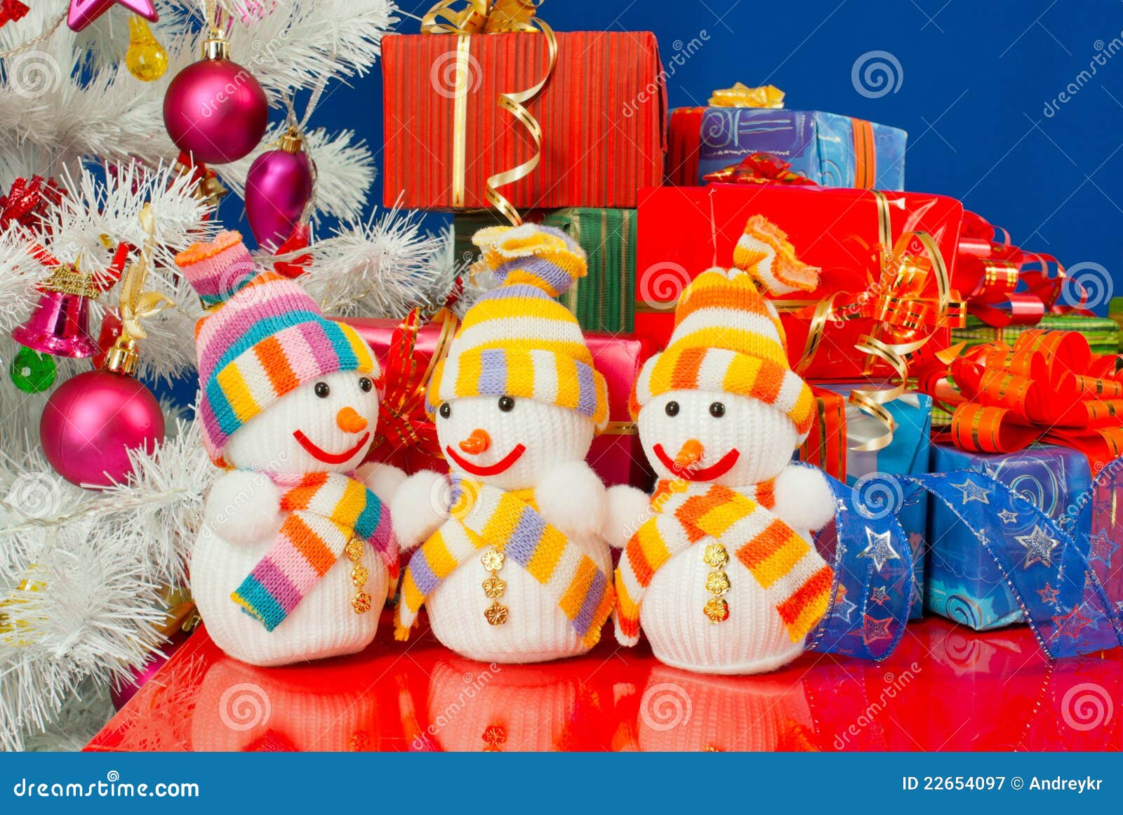 Three Snowmen in Front of the Christmas Presents Stock Image - Image of ...