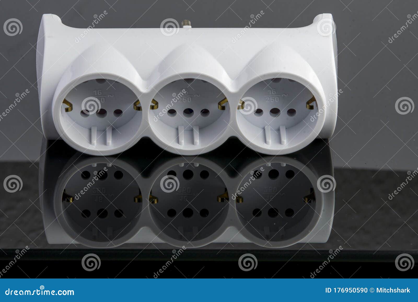 Three Socket Strips in White on Mirror Table Stock Photo - Image of ...
