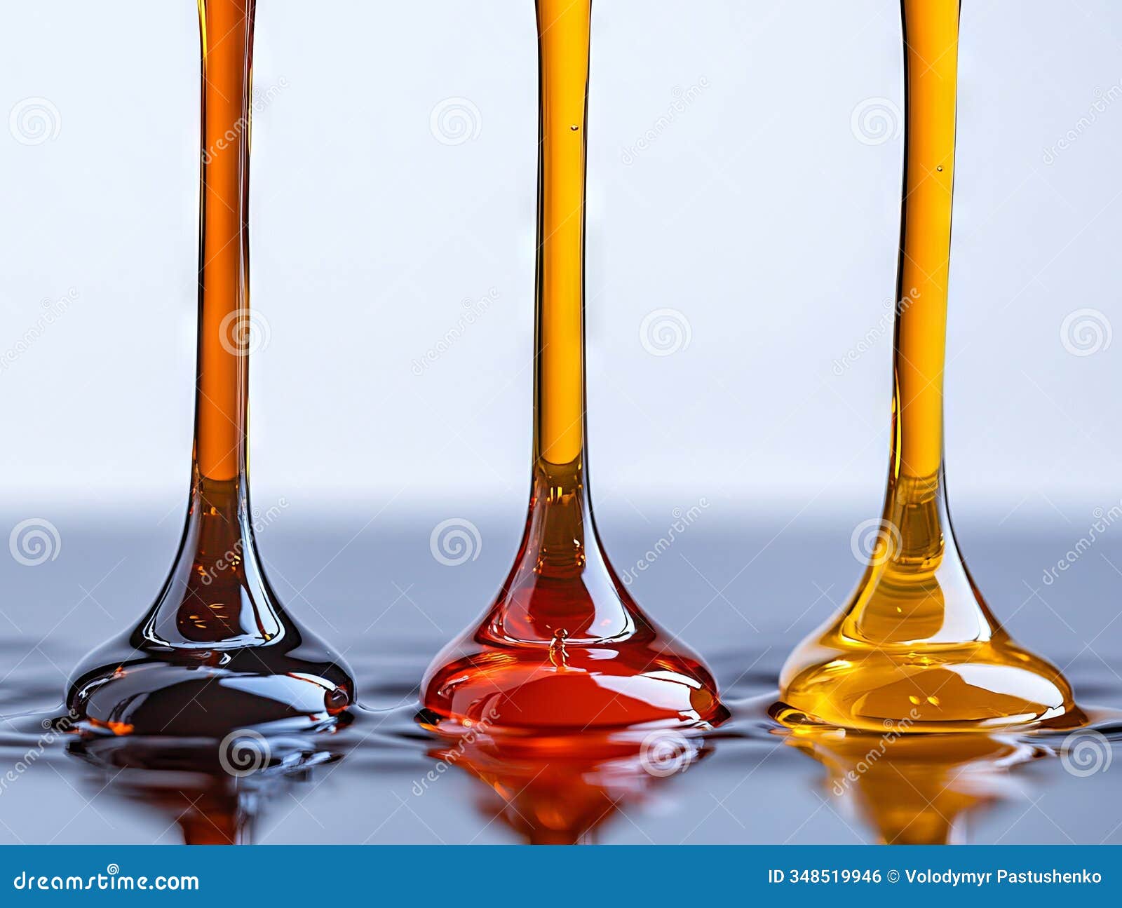 Three Spoons of Honey Dripping from One of Them into the Other Stock ...