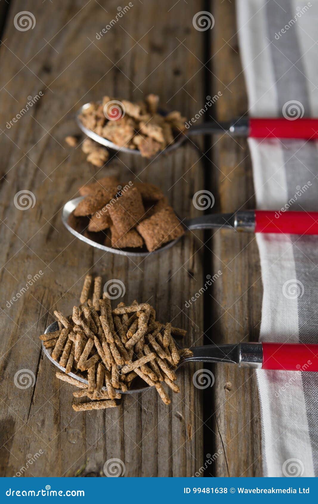 Three Spoons with Various Breakfast Cereals Stock Photo - Image of ...