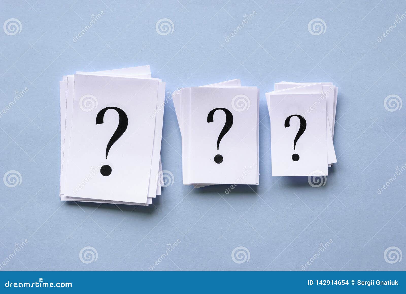 Three Stacked Heaps of Paper with Question Marks Stock Photo - Image of ...