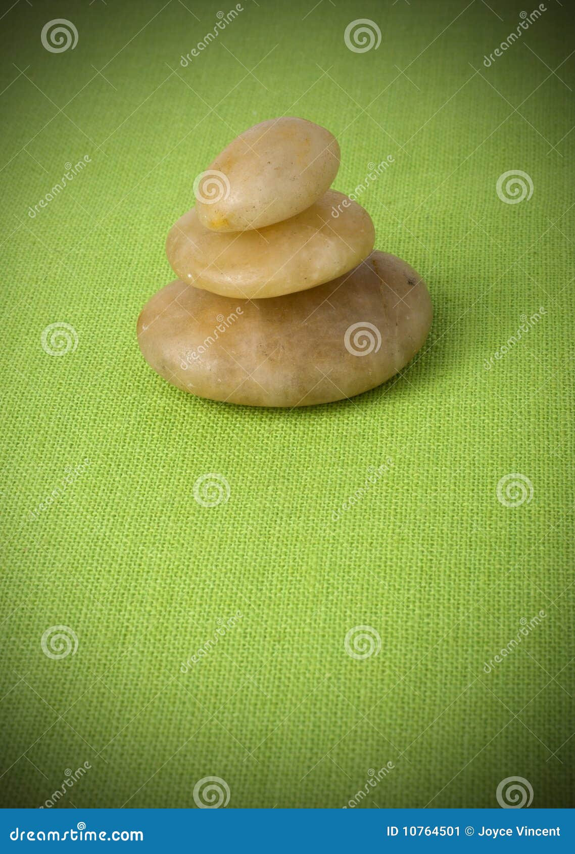 Three stacked river rocks stock image. Image of green - 10764501