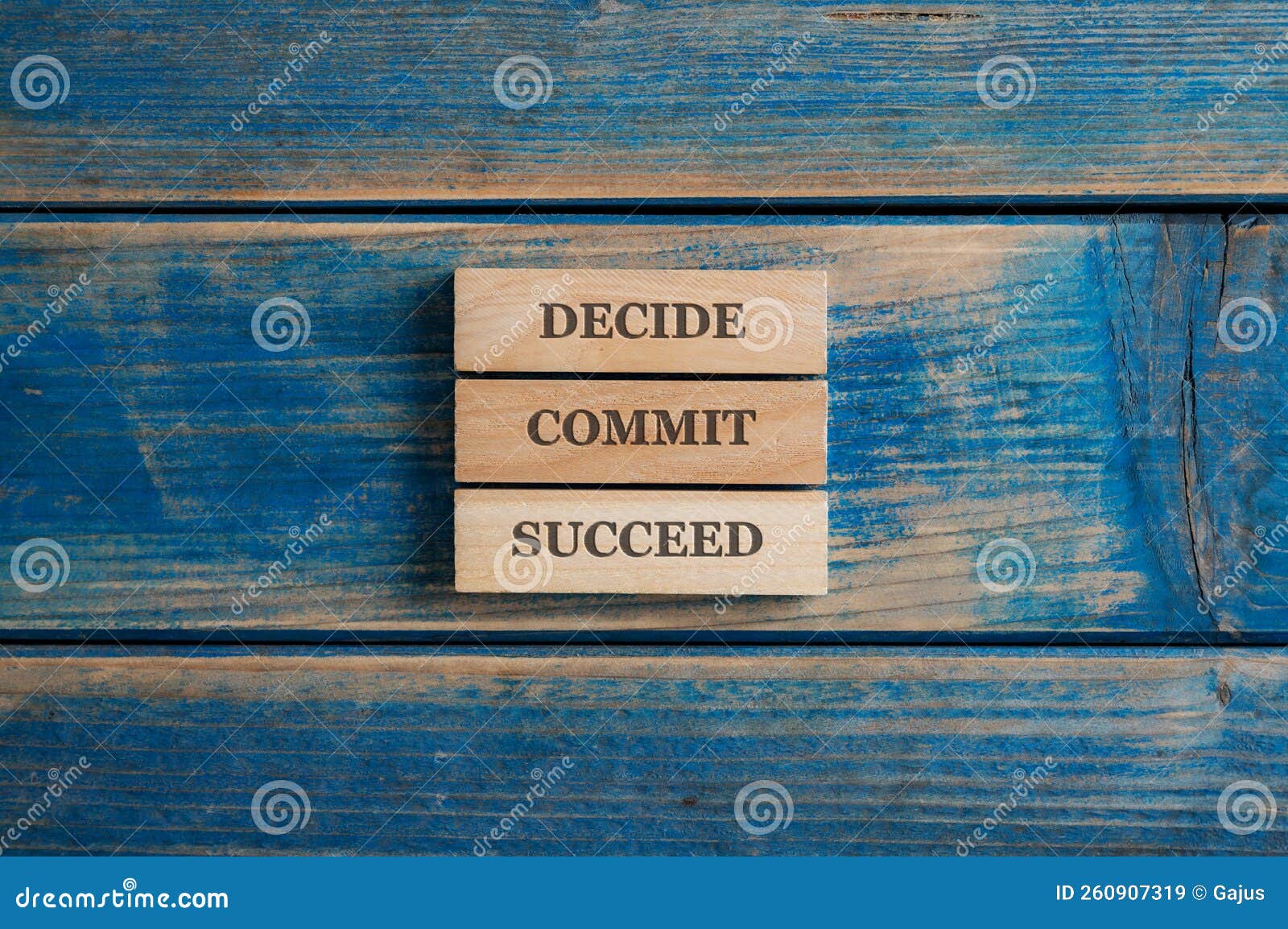 Three Stacked Wooden Pegs Each Carrying a Different Word - Decide ...