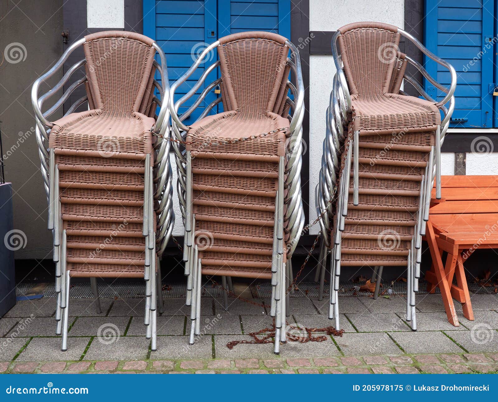 Three Stacks of Chairs Standing Side by Side. a Stack of Chairs Tied ...