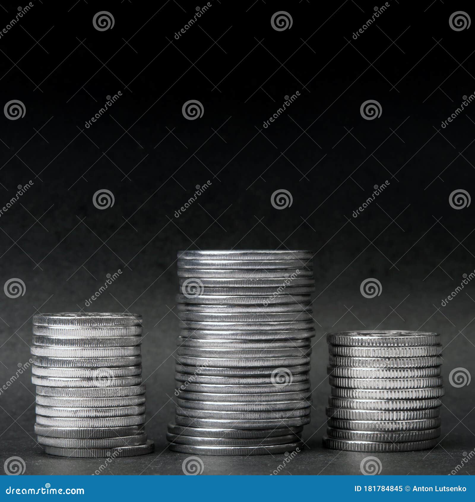Three Stacks of Coins on a Black Background Stock Image - Image of ...