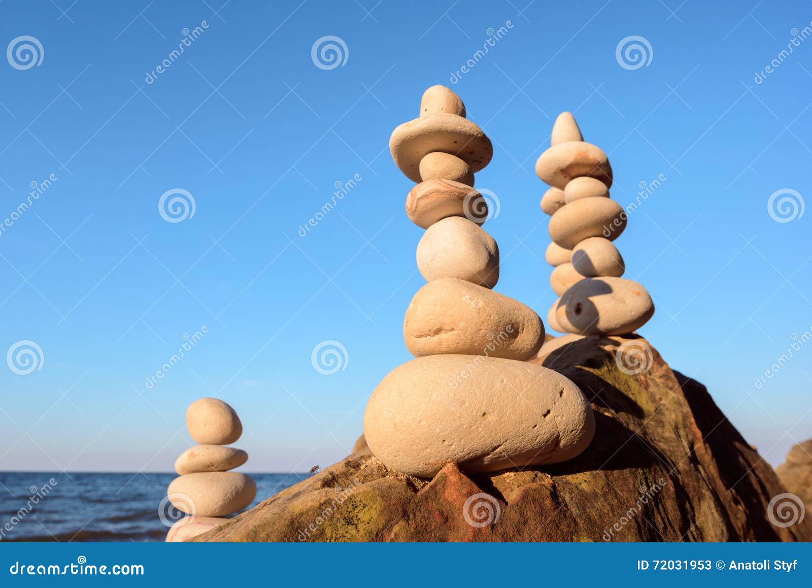 Three stacks of stones stock image. Image of equilibration - 72031953