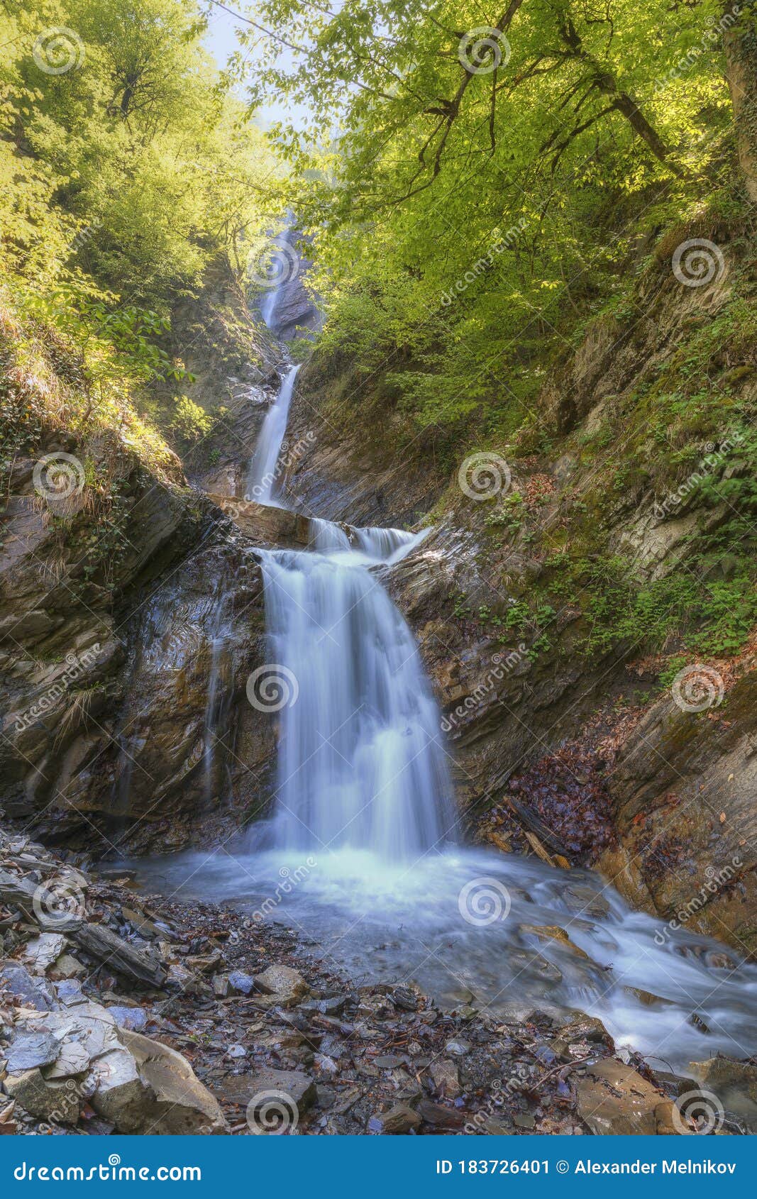 Three-stage Waterfall in the Spring in the Mountains Stock Image ...