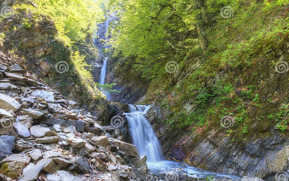Three-stage Waterfall in the Spring in the Mountains Stock Image ...