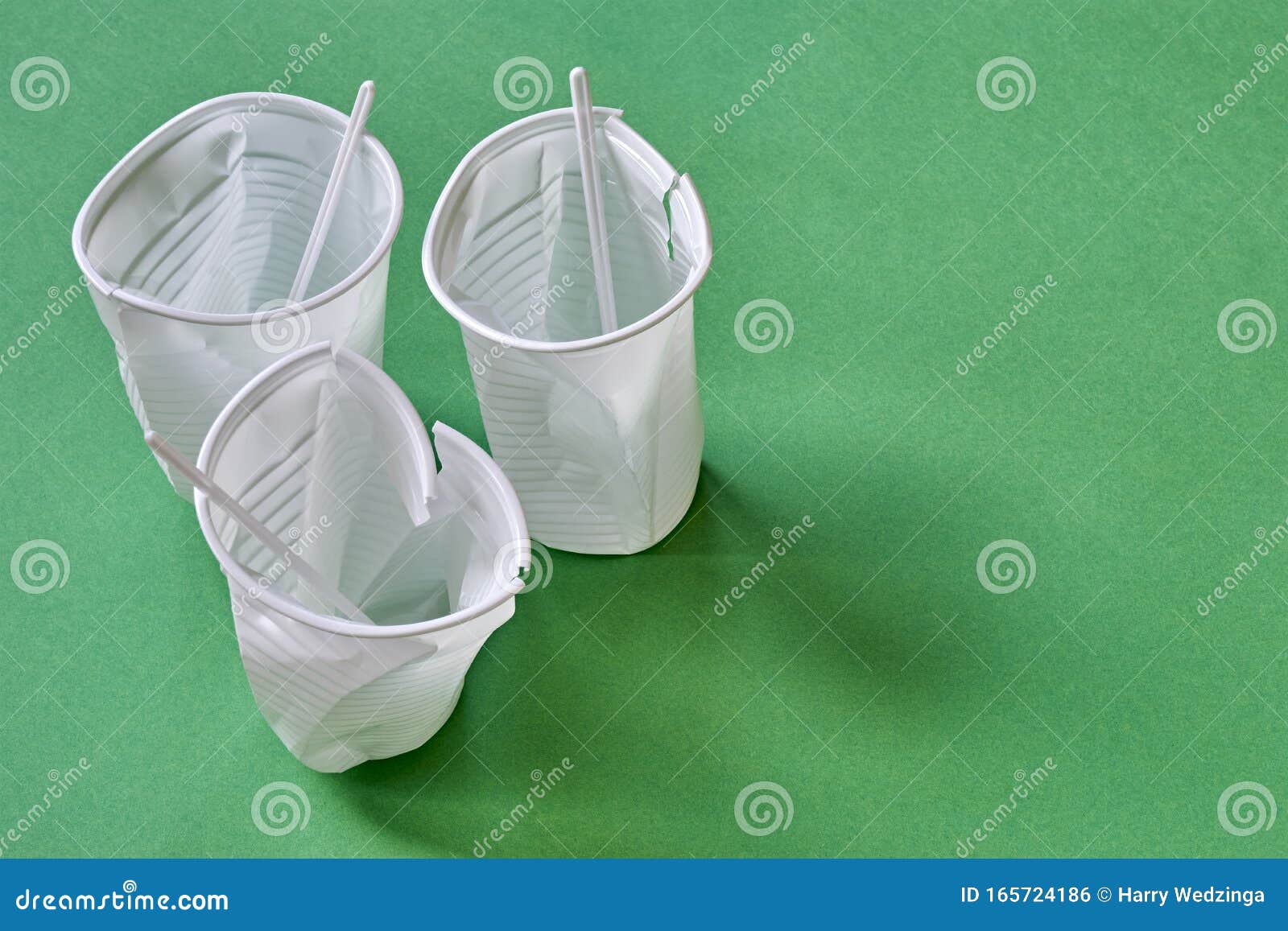 Three Plastic Coffee Cups on Green Stock Photo - Image of cups, nature ...