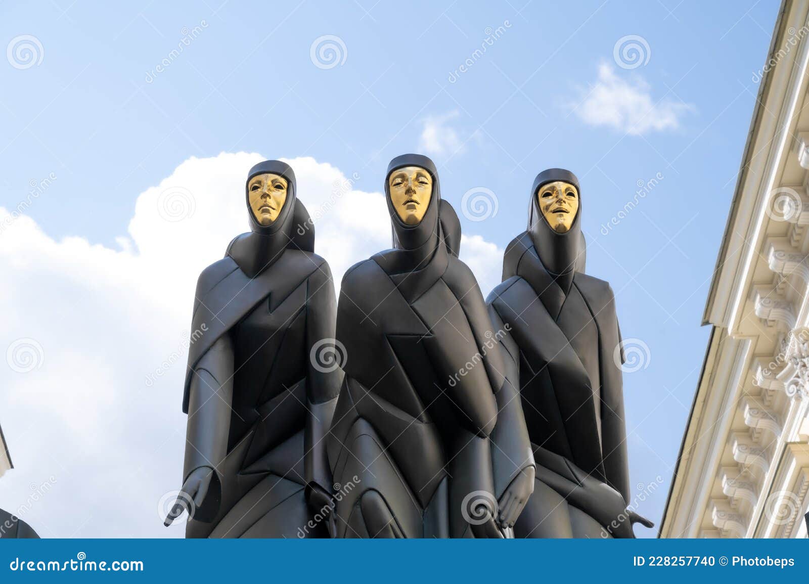 Three Statues with the Golden Mask in Vilnius Editorial Image - Image ...