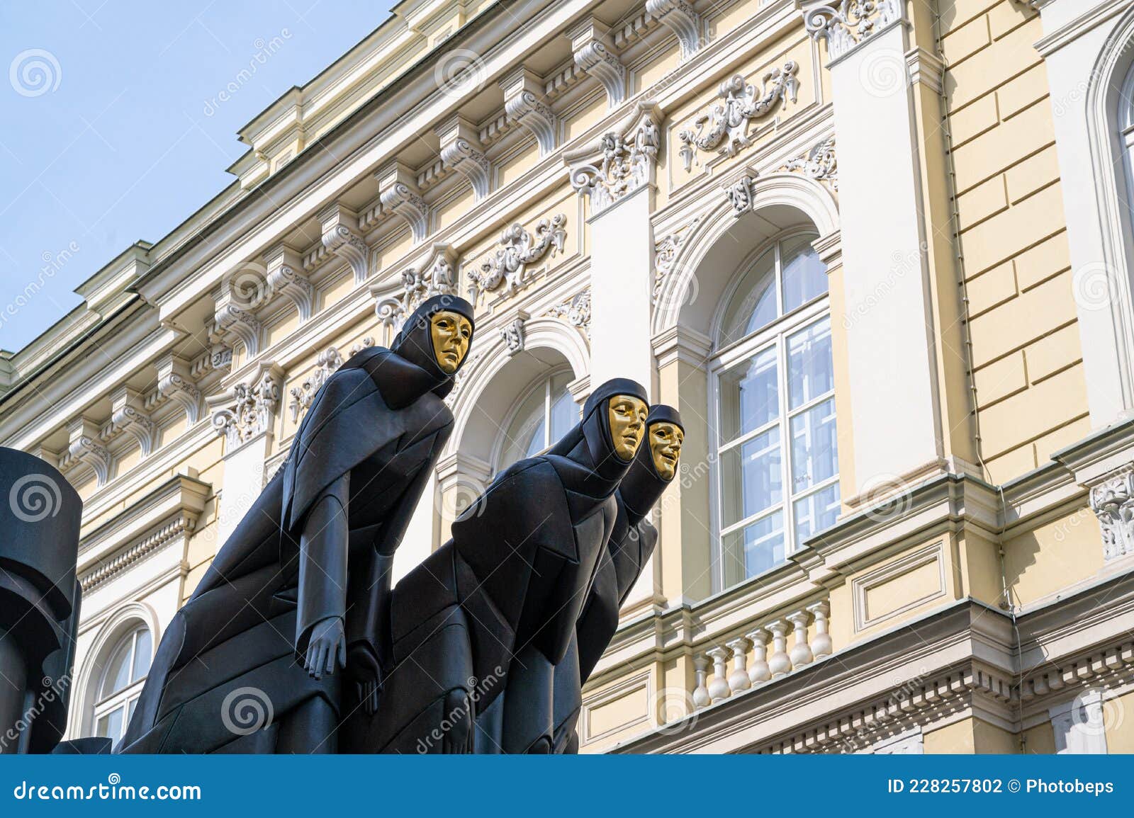 Three Statues with the Golden Mask in Vilnius Editorial Photography ...