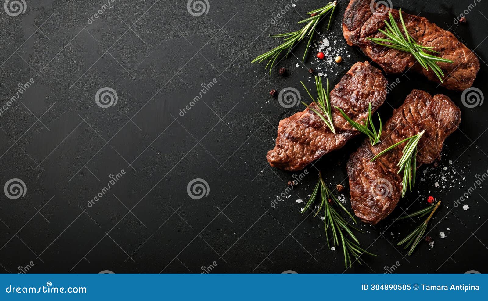 Three Steaks with Rosemary and Spices on a Dark Table. Copy Space. View ...