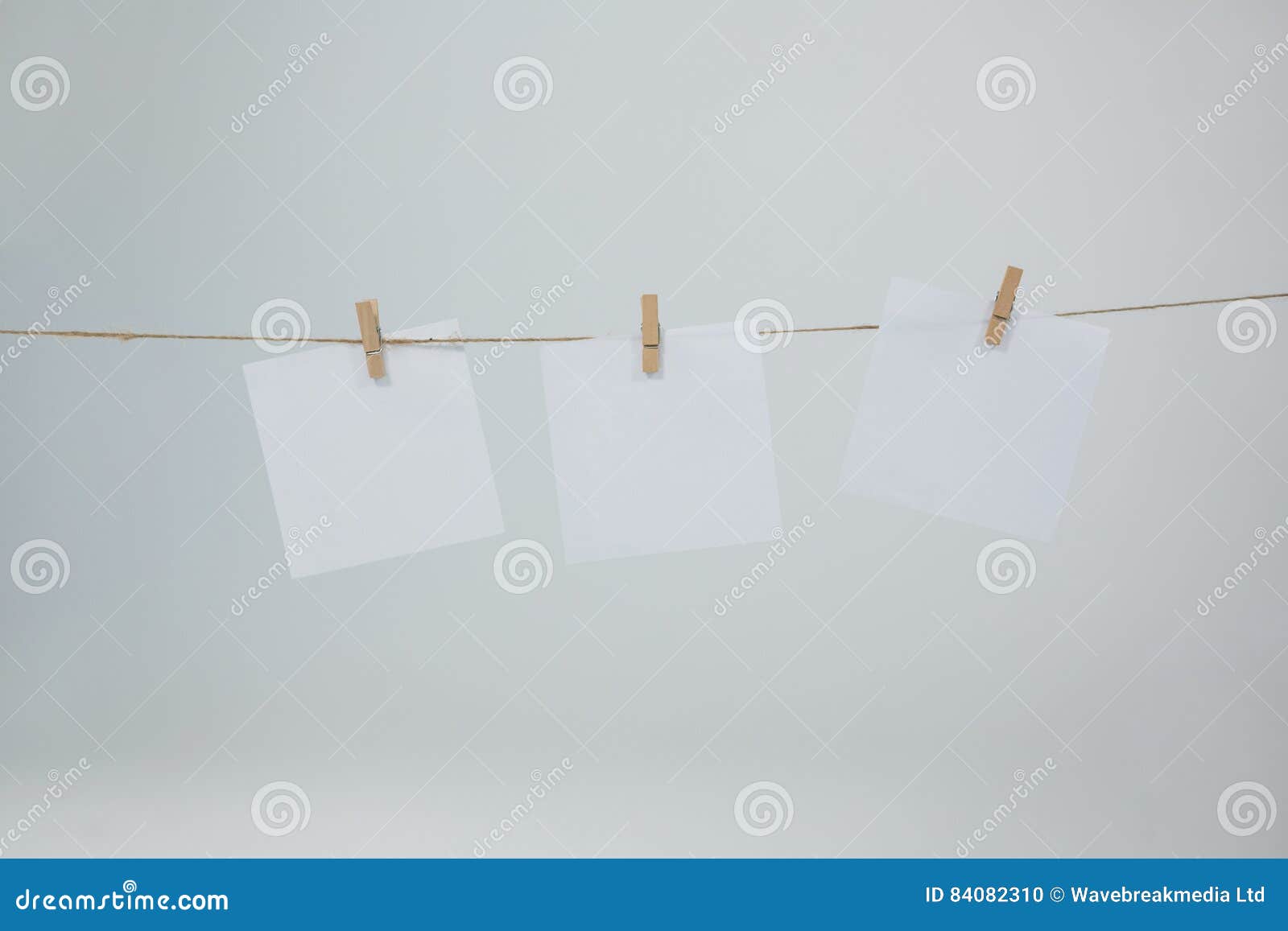 Three Sticky Notes Hanging on Clothes Line Stock Photo - Image of shot ...