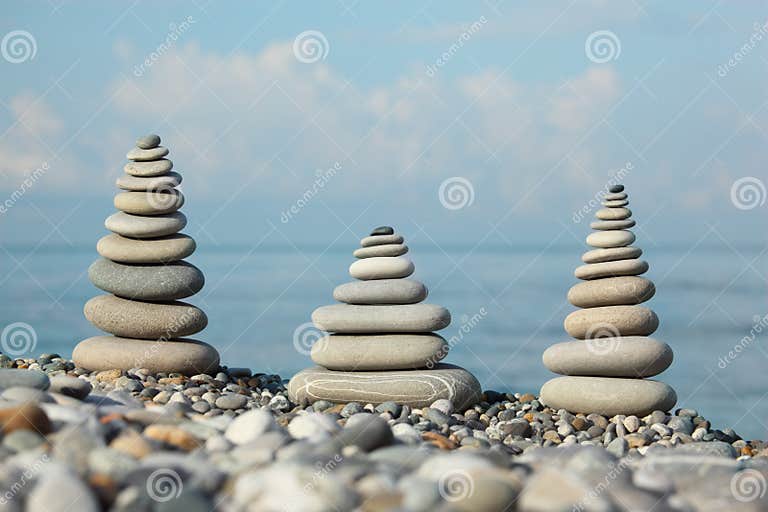 Three Stone Stacks on Pebble Beach Stock Photo - Image of beauty ...
