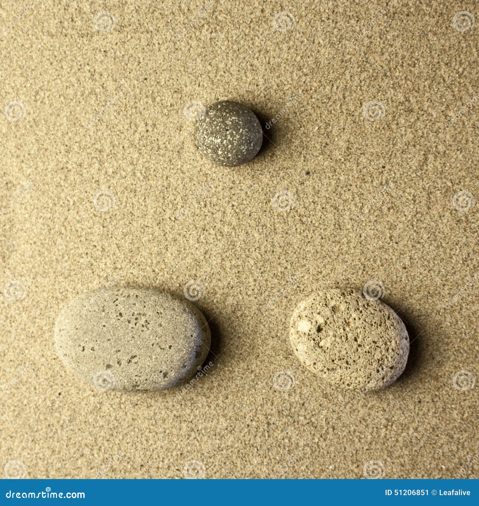 Three stones in the sand stock image. Image of harmony - 51206851