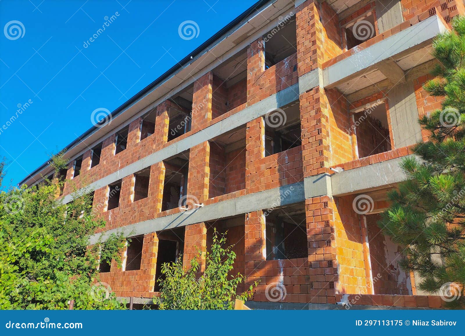 Three-storey Building Under Construction Made of Red Brick and Concrete ...