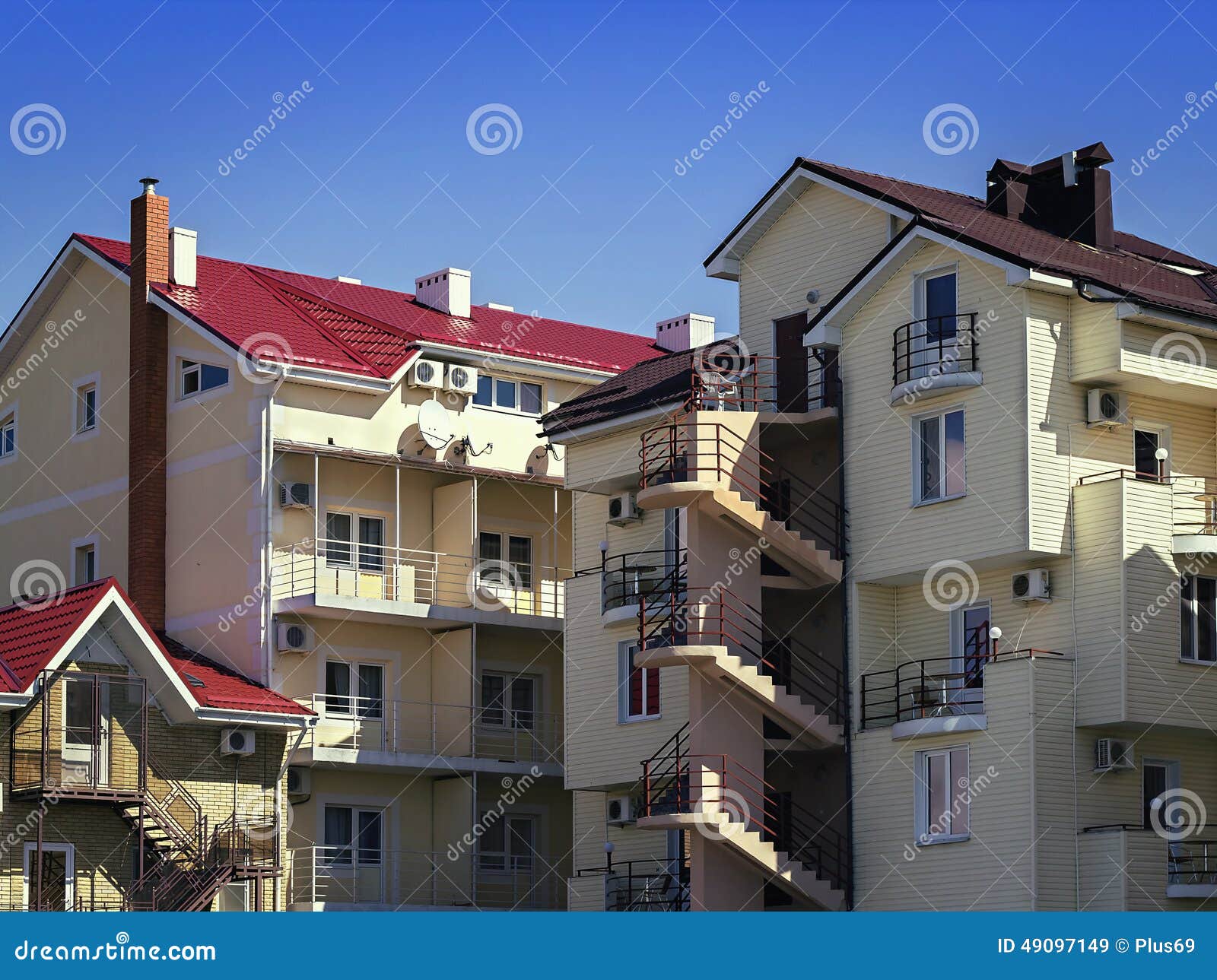 Three-storey Hotel Decorated with Beige Siding Stock Image - Image of ...
