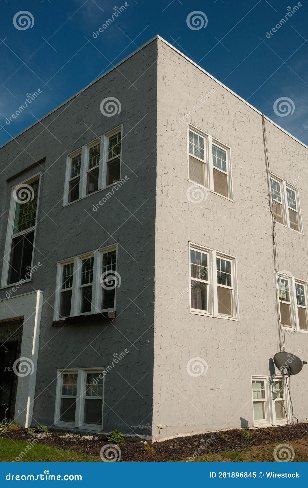 Three-story Apartment Building with Windows Stock Image - Image of ...