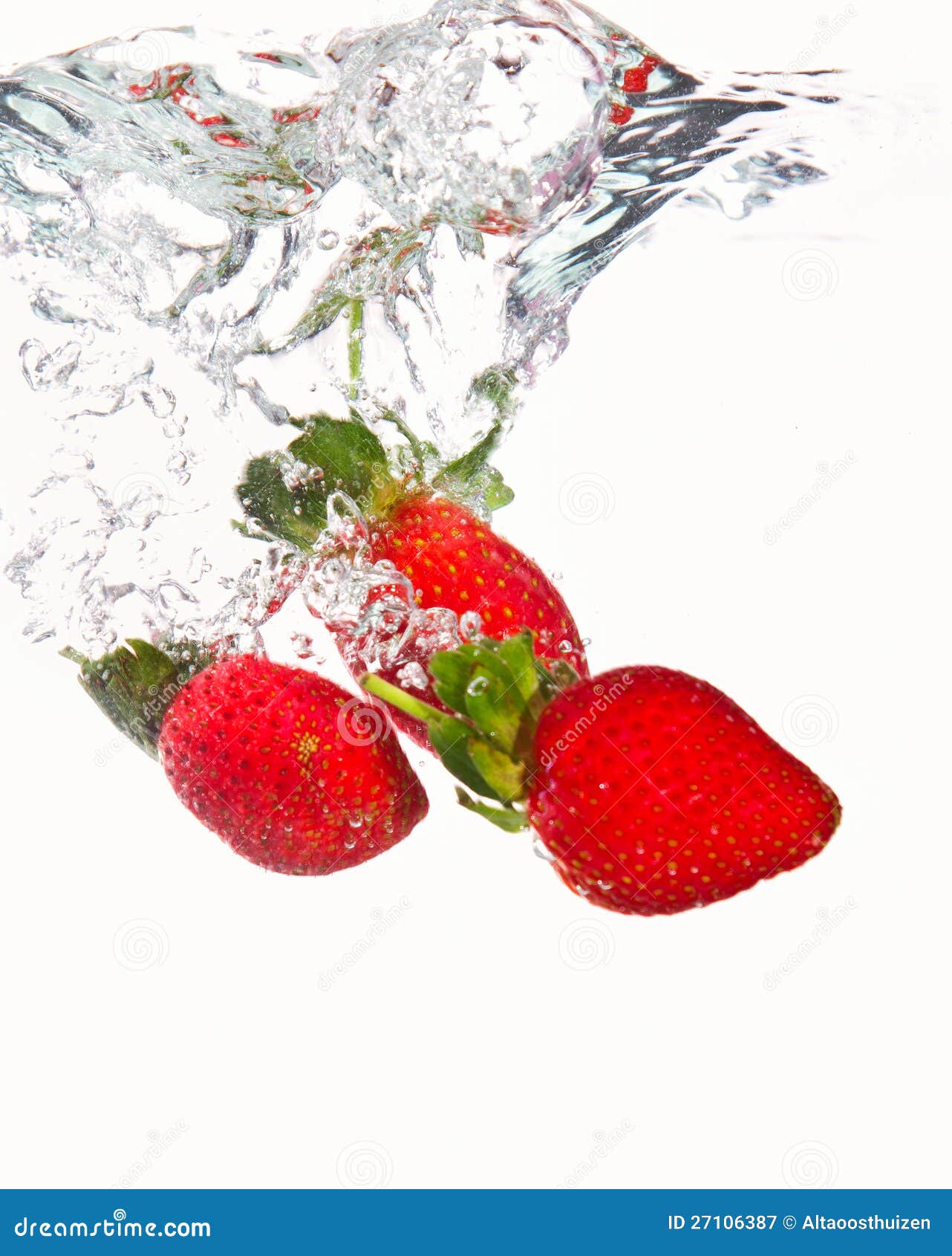 Three strawberries falling stock image. Image of crystal - 27106387