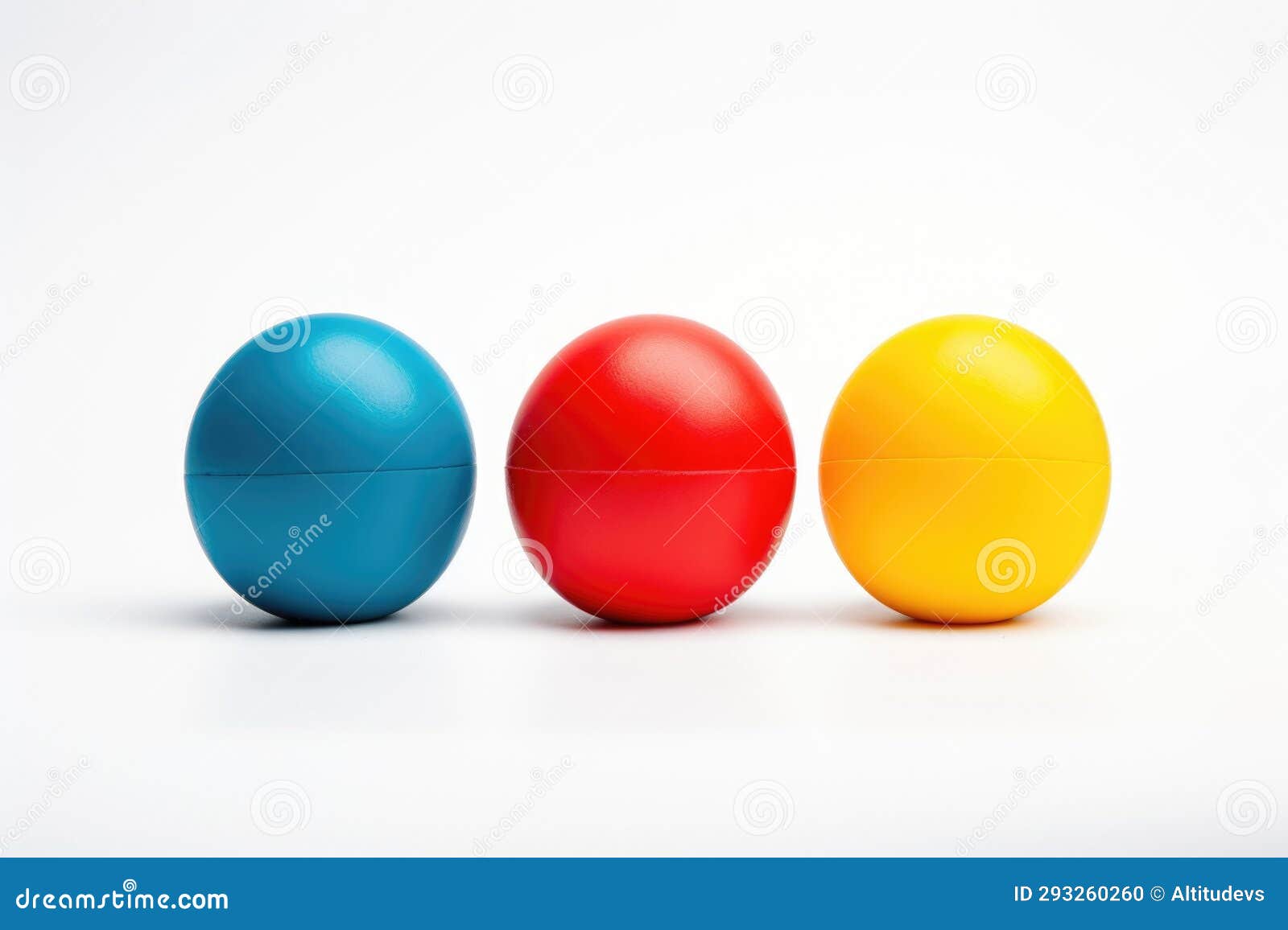 Three Stress Balls of Different Colors on a White Backdrop Stock Photo ...