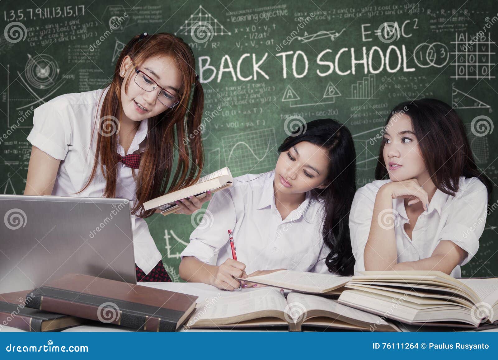 Three Students Back To School and Studying in Class Stock Photo - Image ...