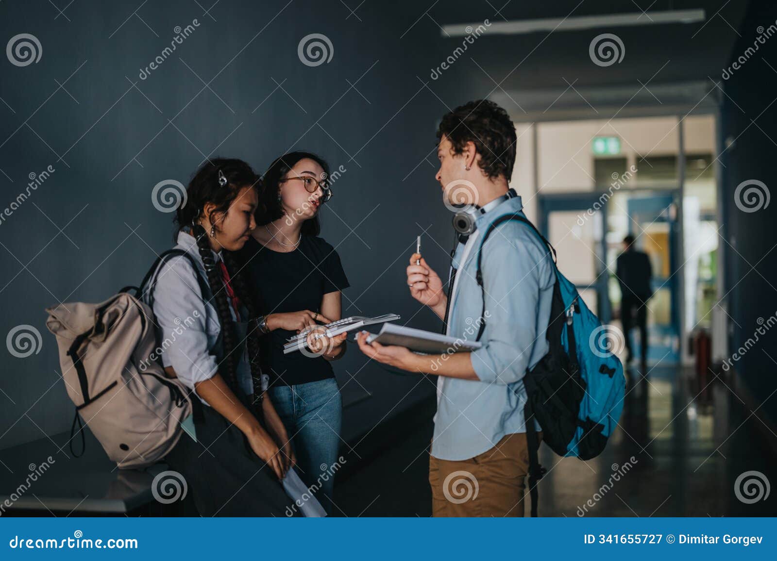 Group of Students Talking in a School Hallway between Classes Stock ...