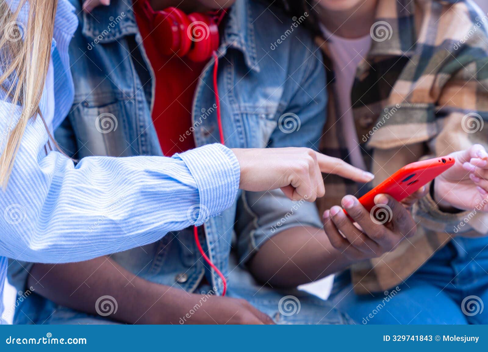 Three Students Having Fun with Mobile Phones Creating Content on Social ...