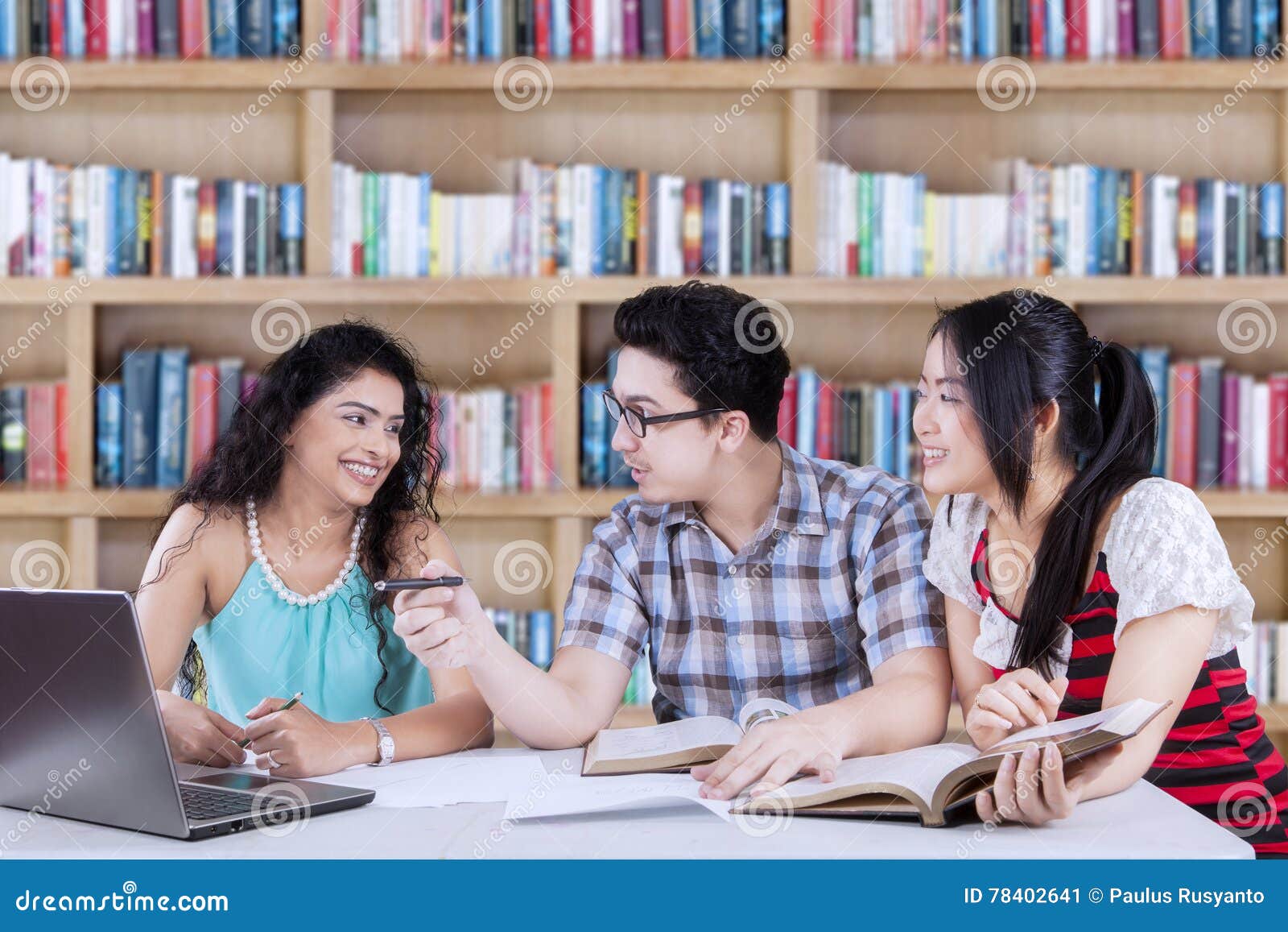 Three Students with Laptop in the Library Stock Image - Image of ...