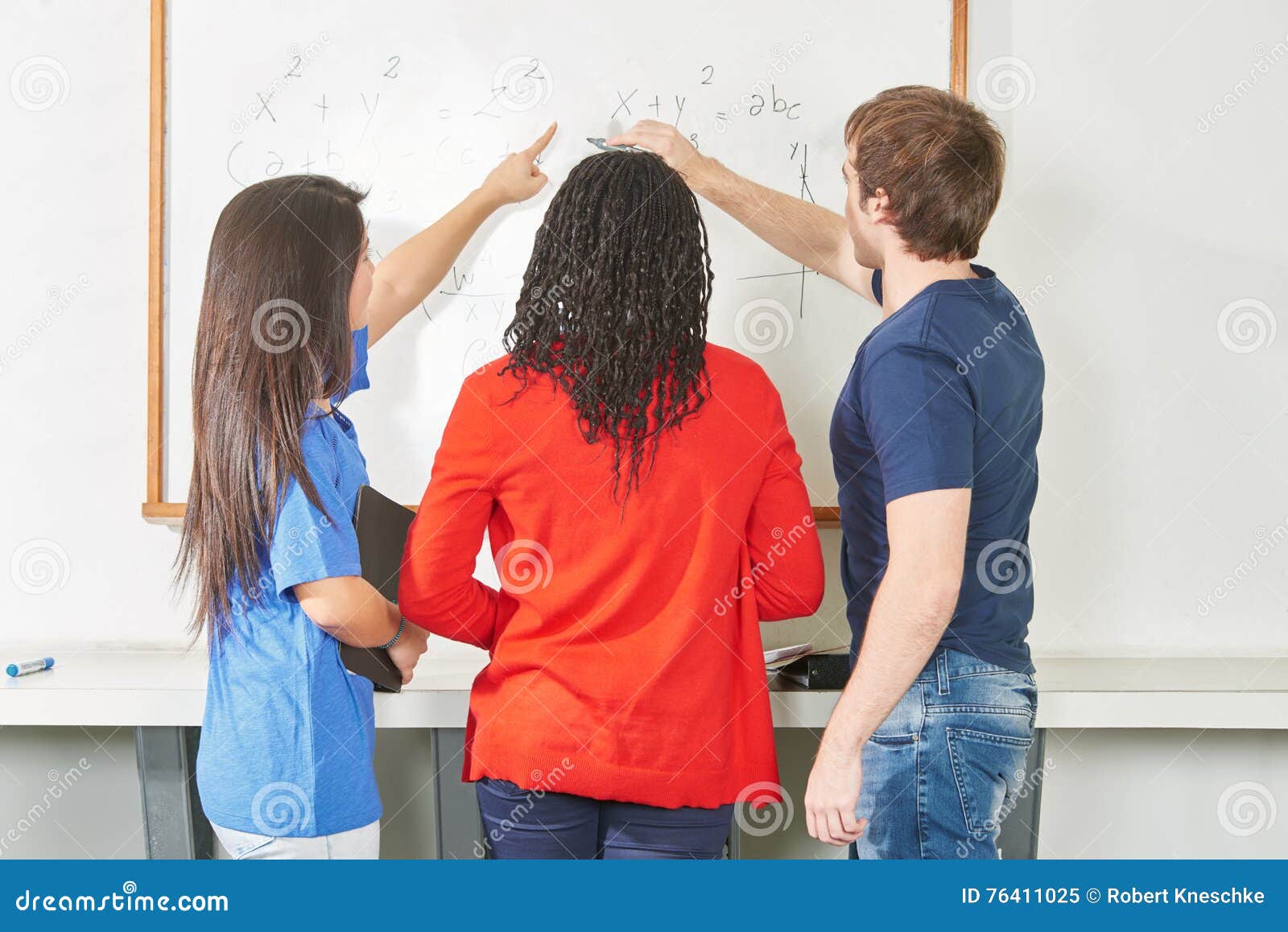 Three students learn math stock image. Image of finger - 76411025