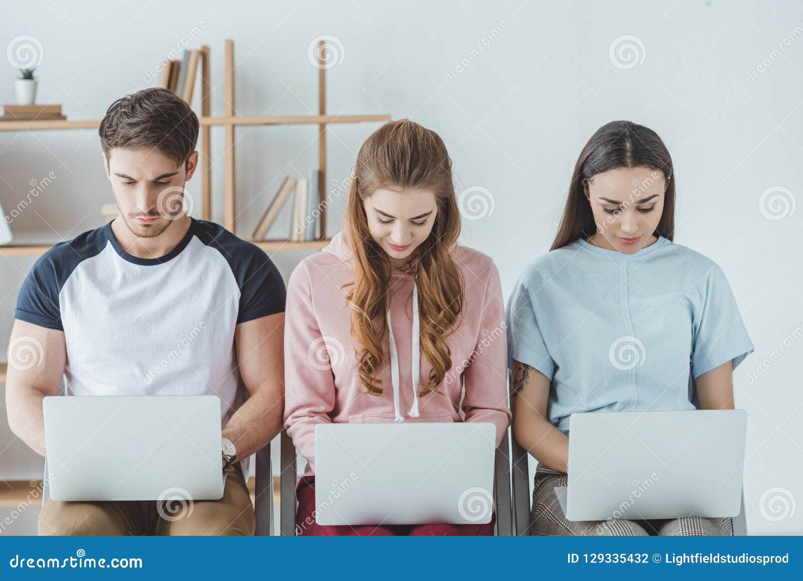 Three Students Sitting and Studying Stock Photo - Image of knowledge ...
