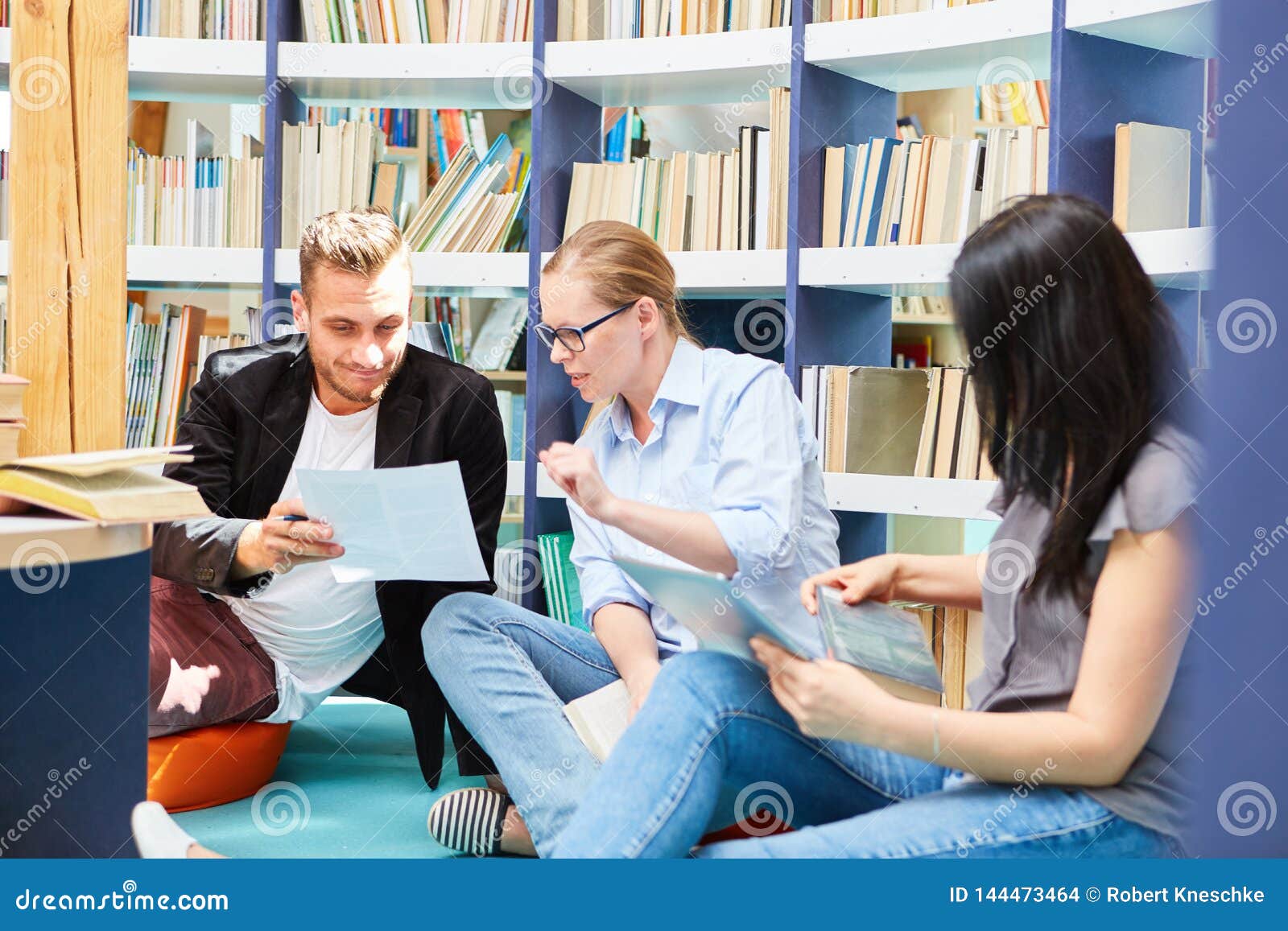 Three Students in Study Group in the Library Stock Photo - Image of ...