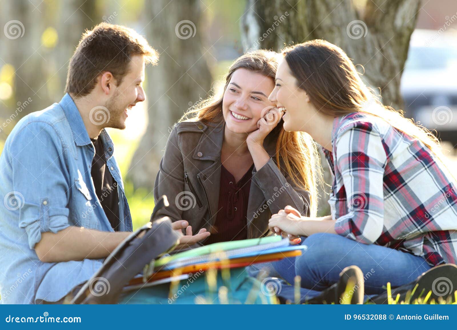 Three Students Talking after Classes Outside Stock Photo - Image of ...