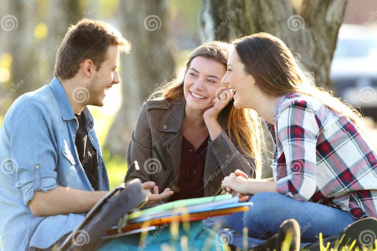 Three Students Talking after Classes Outside Stock Photo - Image of ...
