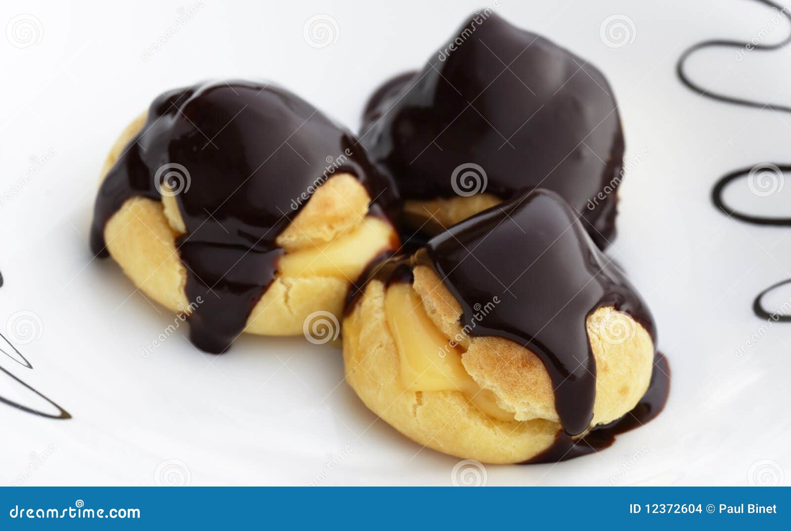 Three sweet profiterole stock photo. Image of cooking - 12372604