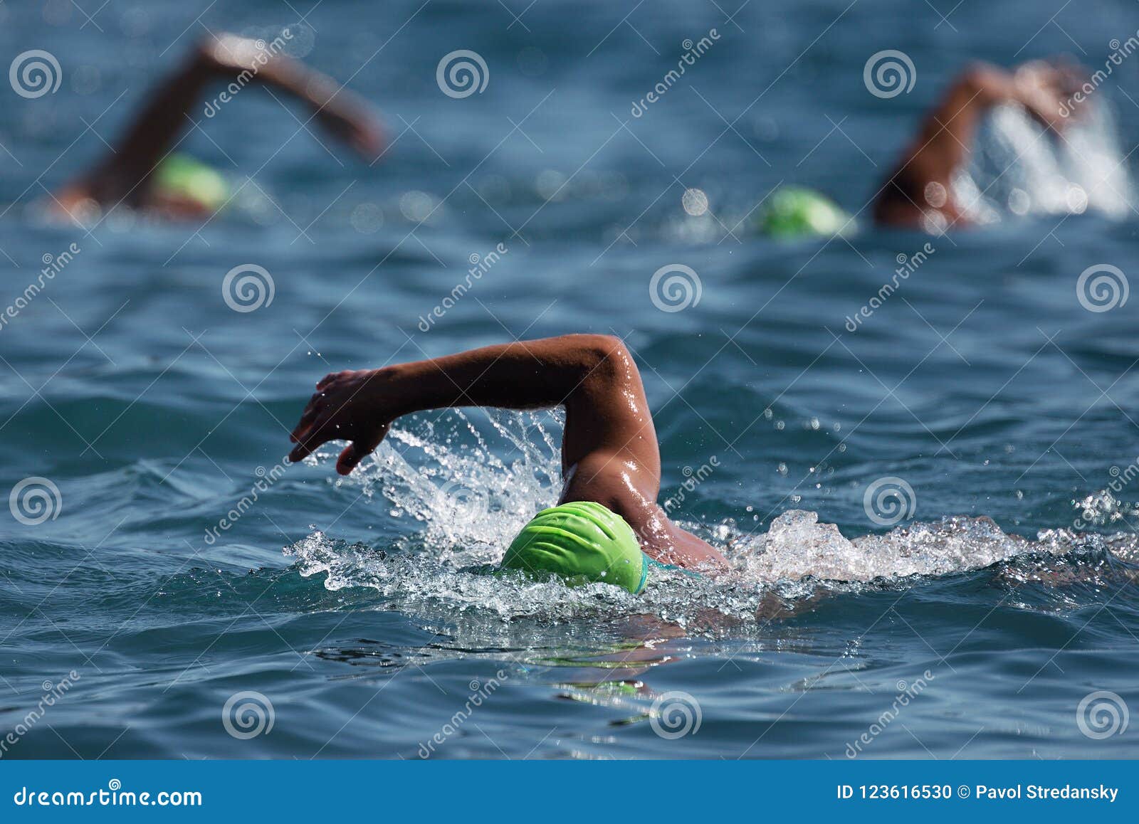 Three Swimmers Swim in the Ocean Editorial Image - Image of ...