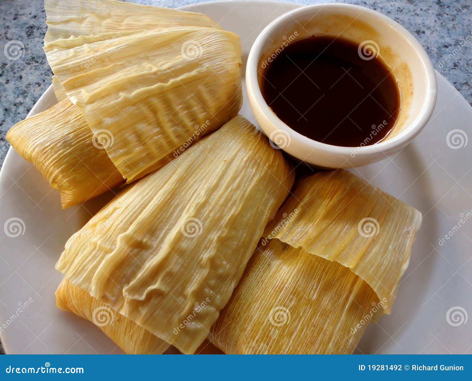Three Tamales stock photo. Image of plate, husks, sauce - 19281492