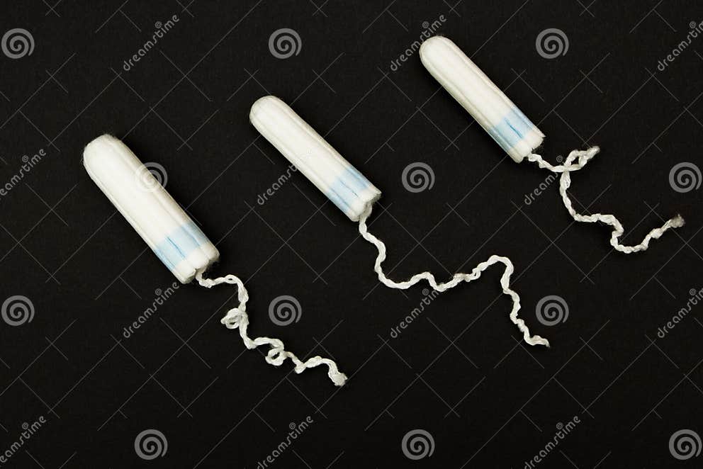 Three Tampon on a Black Background Stock Image - Image of medicine ...