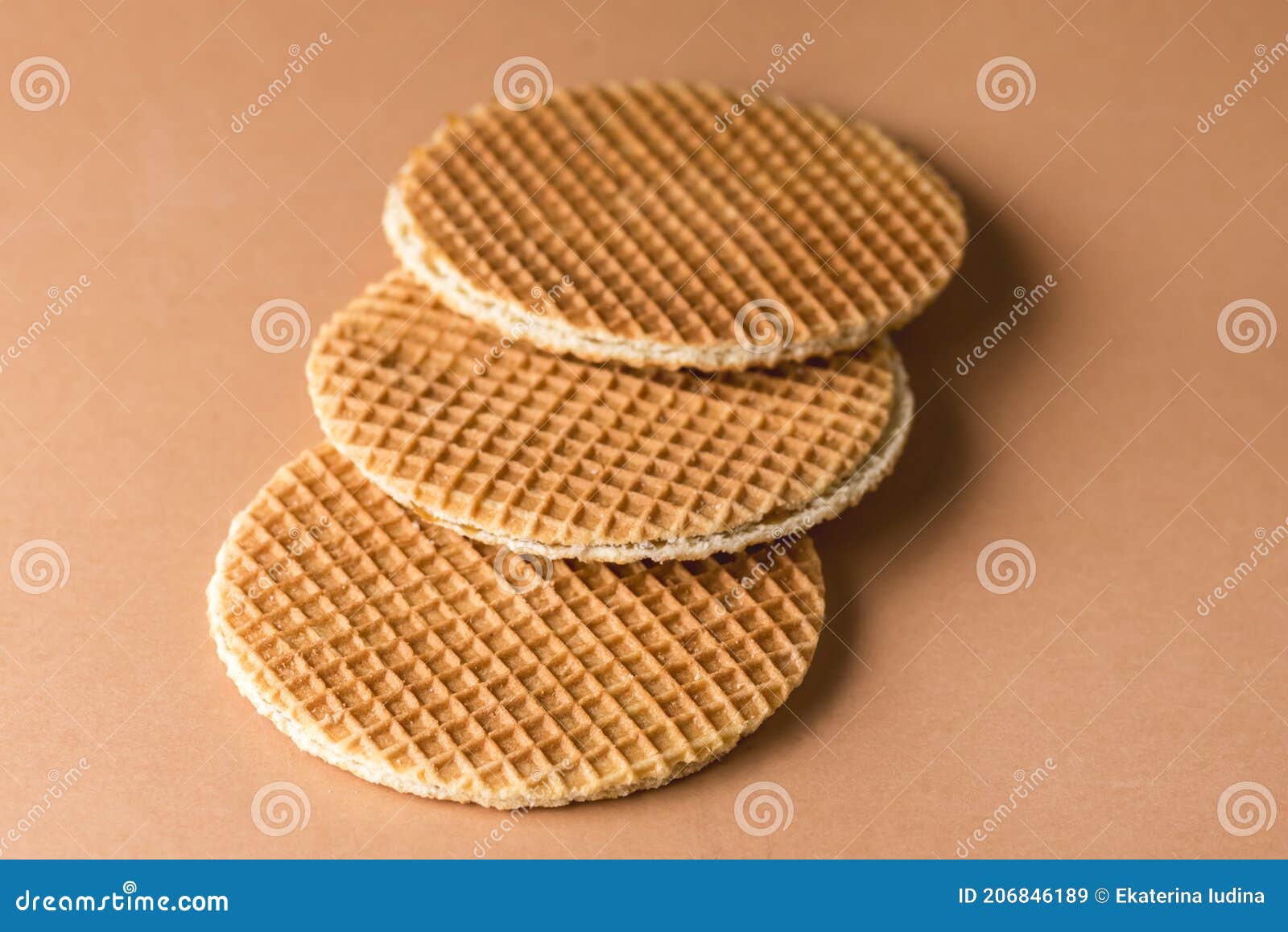 Three Tasty Holland Waffles with Caramel on Light Brown Background ...