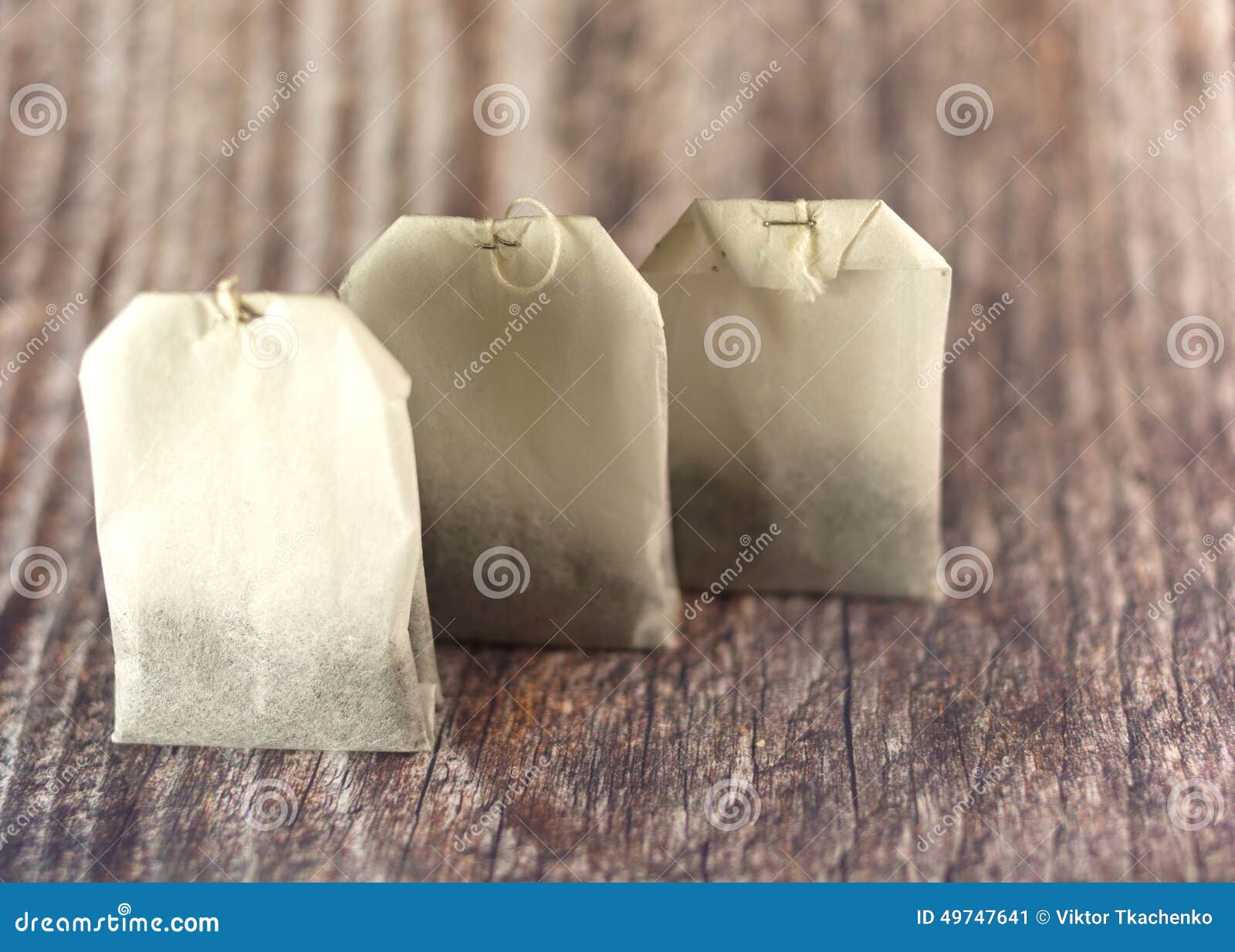 Three Tea Bags on Wooden Background Stock Image - Image of blend, paper ...