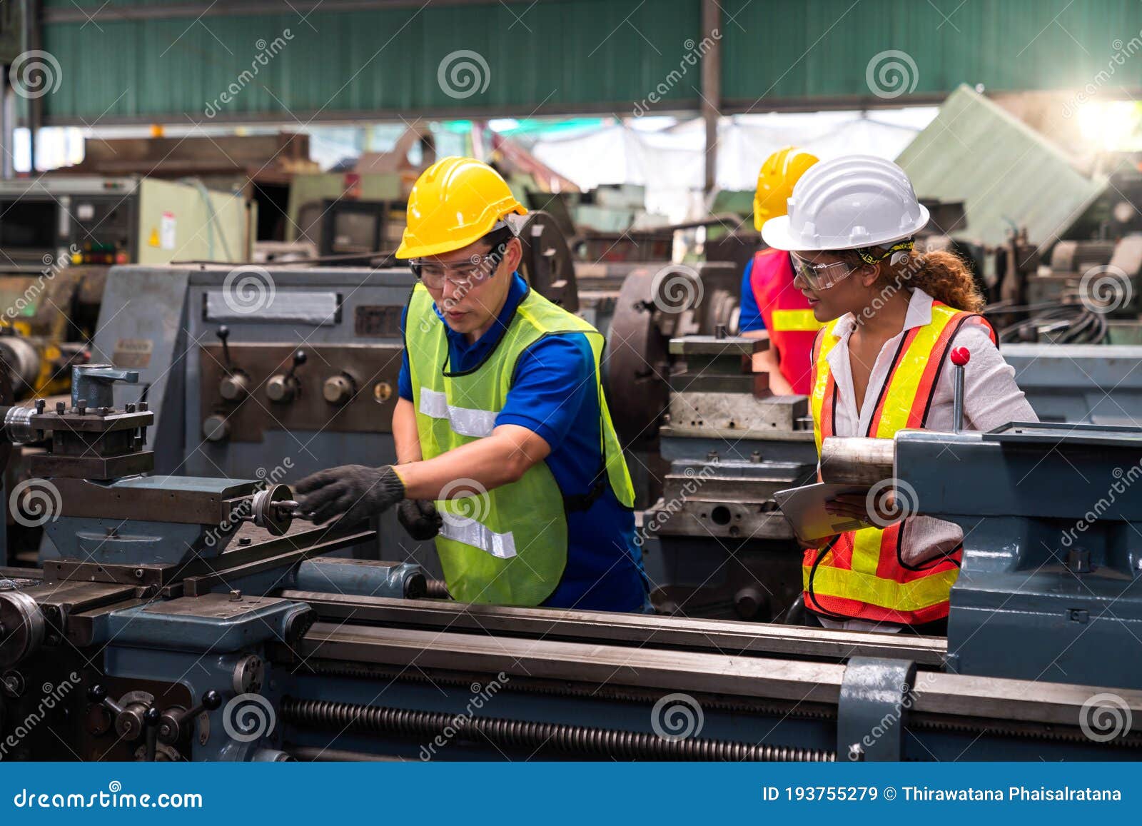 Three Technicians are Working on Industrial Machines Stock Image ...