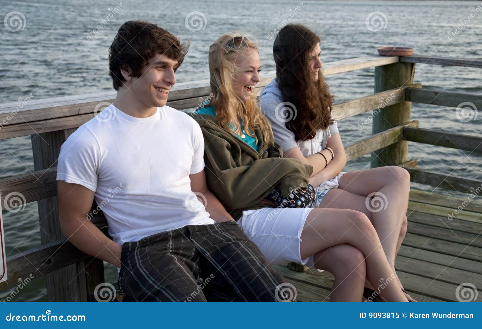 Three Teenagers Laughing stock image. Image of male, teens - 9093815