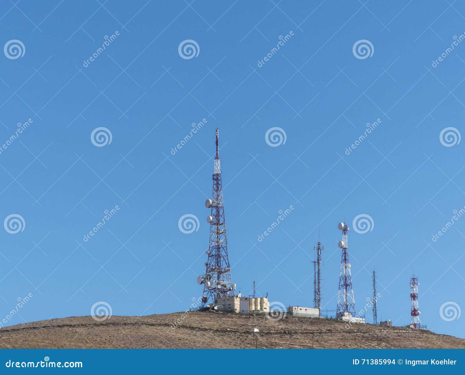 Three Telecommunication Masts on a Mountain Top. Stock Photo - Image of ...