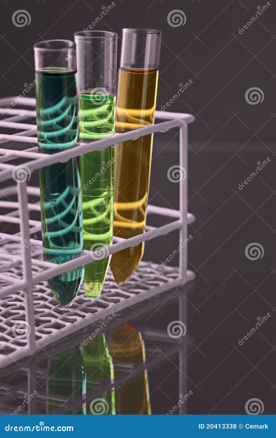 Three Test-tubes with Fluids in a Stand Stock Photo - Image of tubes ...