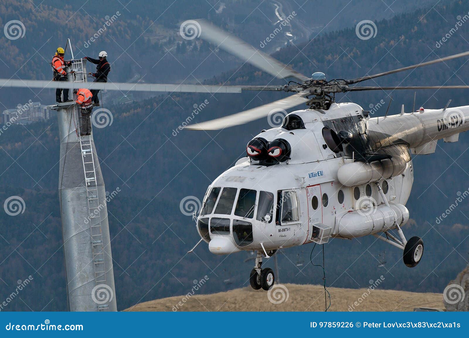 Three Thumping Assemblers Under the Helicopter Editorial Photo - Image ...