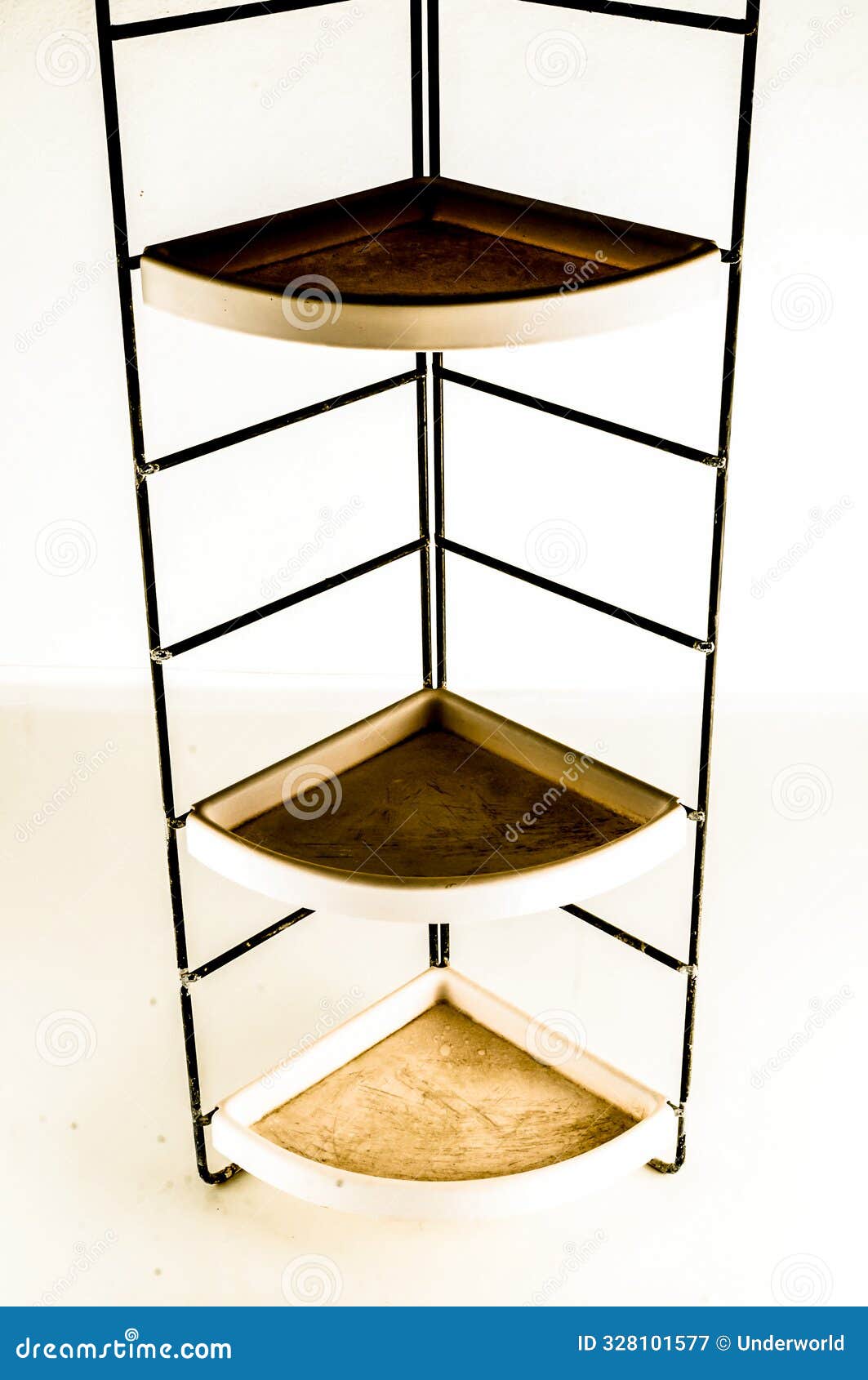 A Three-tiered Shelf with a White Base and Brown Trim Stock Image ...