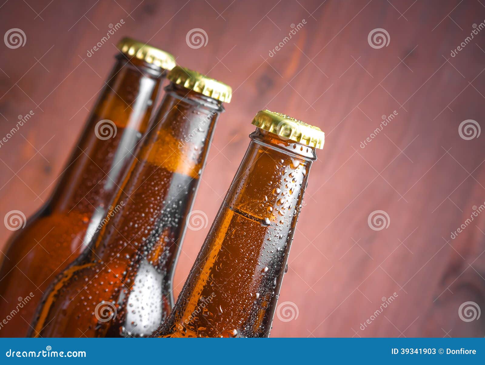 Three Tilted Bottles of Fresh Beer with Drops Stock Image - Image of ... Three Tilted Bottles of Fresh Beer with Drops Stock Image - Image of ...