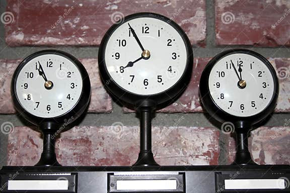Three time zone clock stock image. Image of alarm, table - 1241467