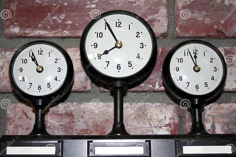 Three time zone clock stock image. Image of alarm, table - 1241467