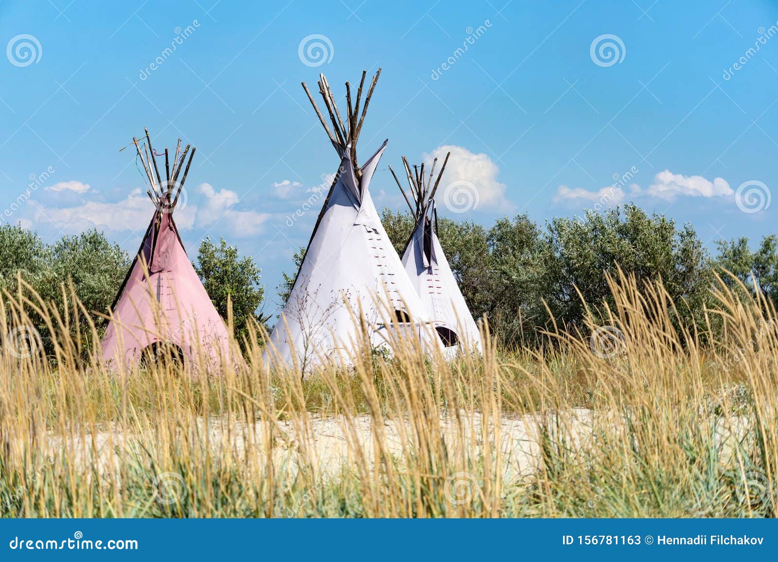Three Tipies Against Blue Sky Stock Image - Image of landscape, summer ...
