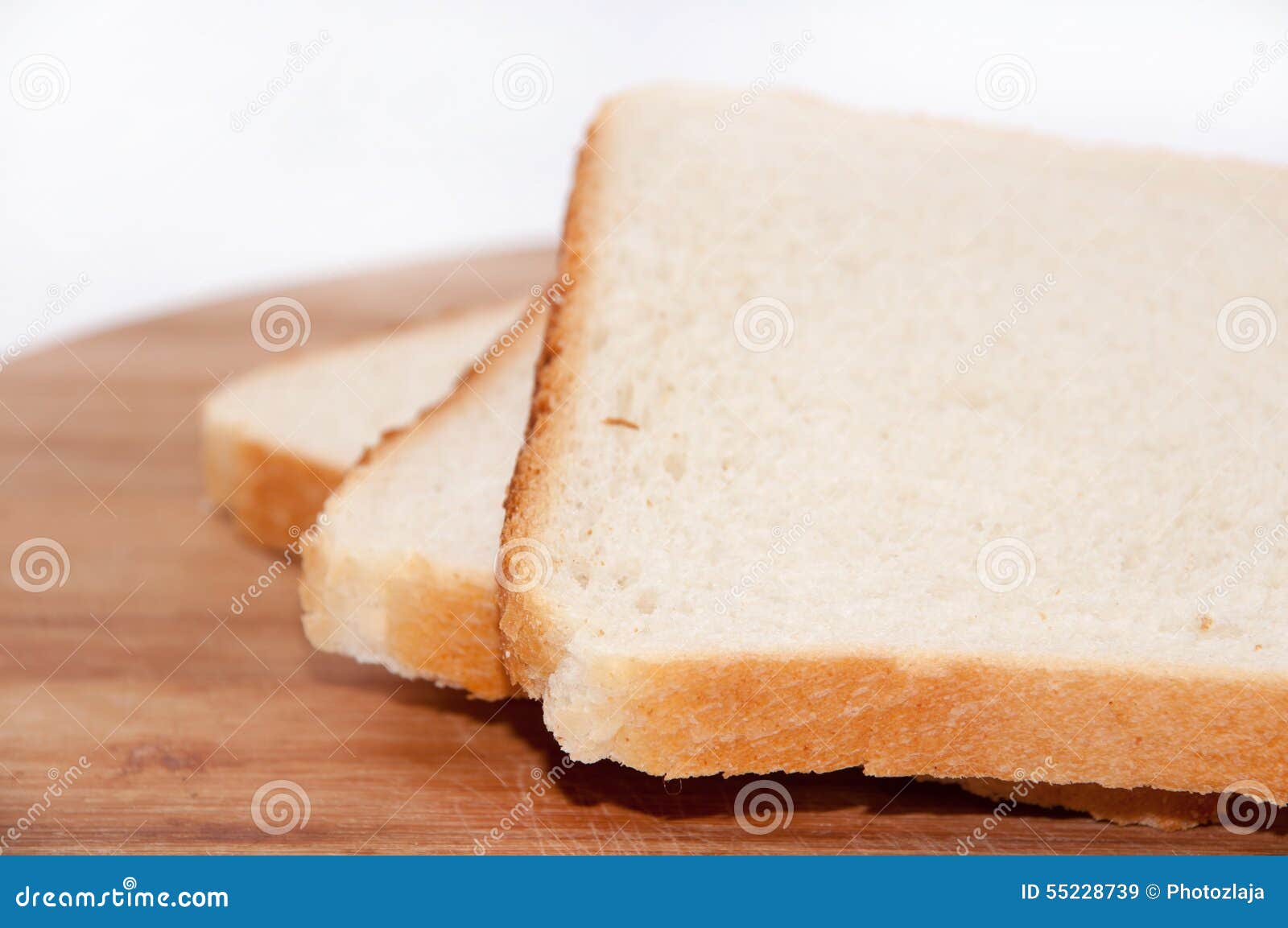 Three Toast Bread Pieces on the Wooden Board Stock Image - Image of ...